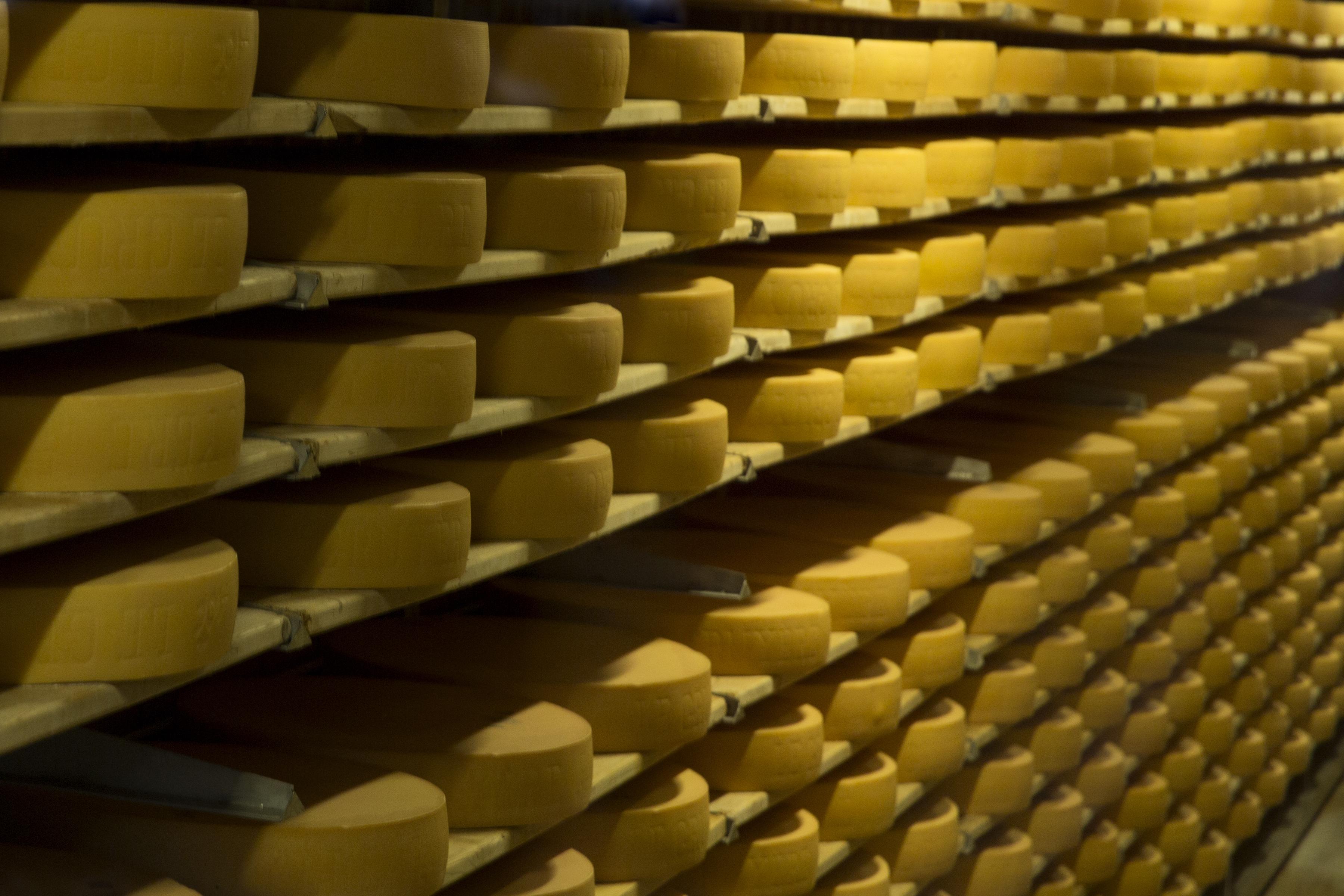 Italian Cheesemaker Dies After Being Crushed By Rounds Of Cheese | iHeart