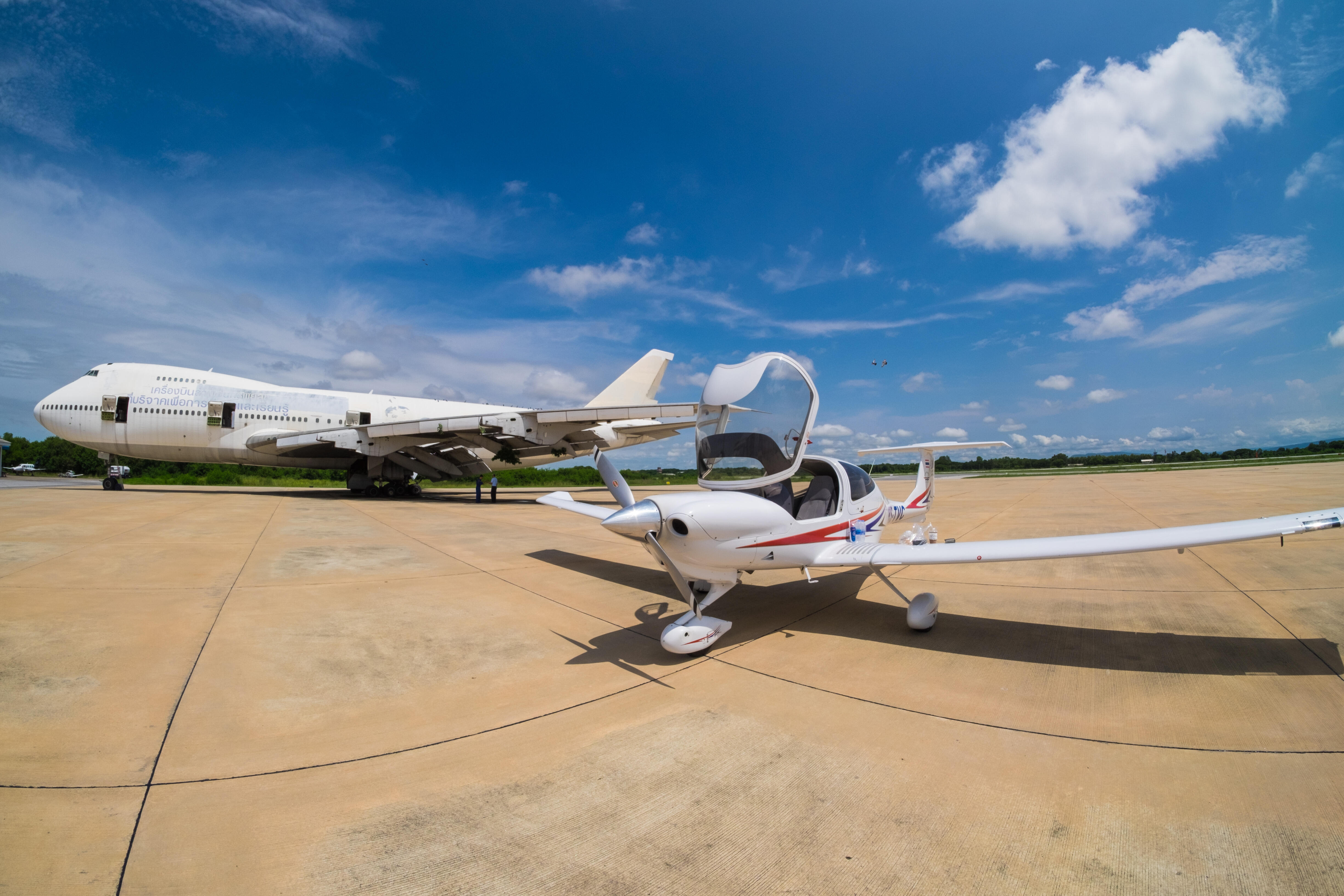 Plane Lands Safely After Door Blows Out Mid Flight | iHeart