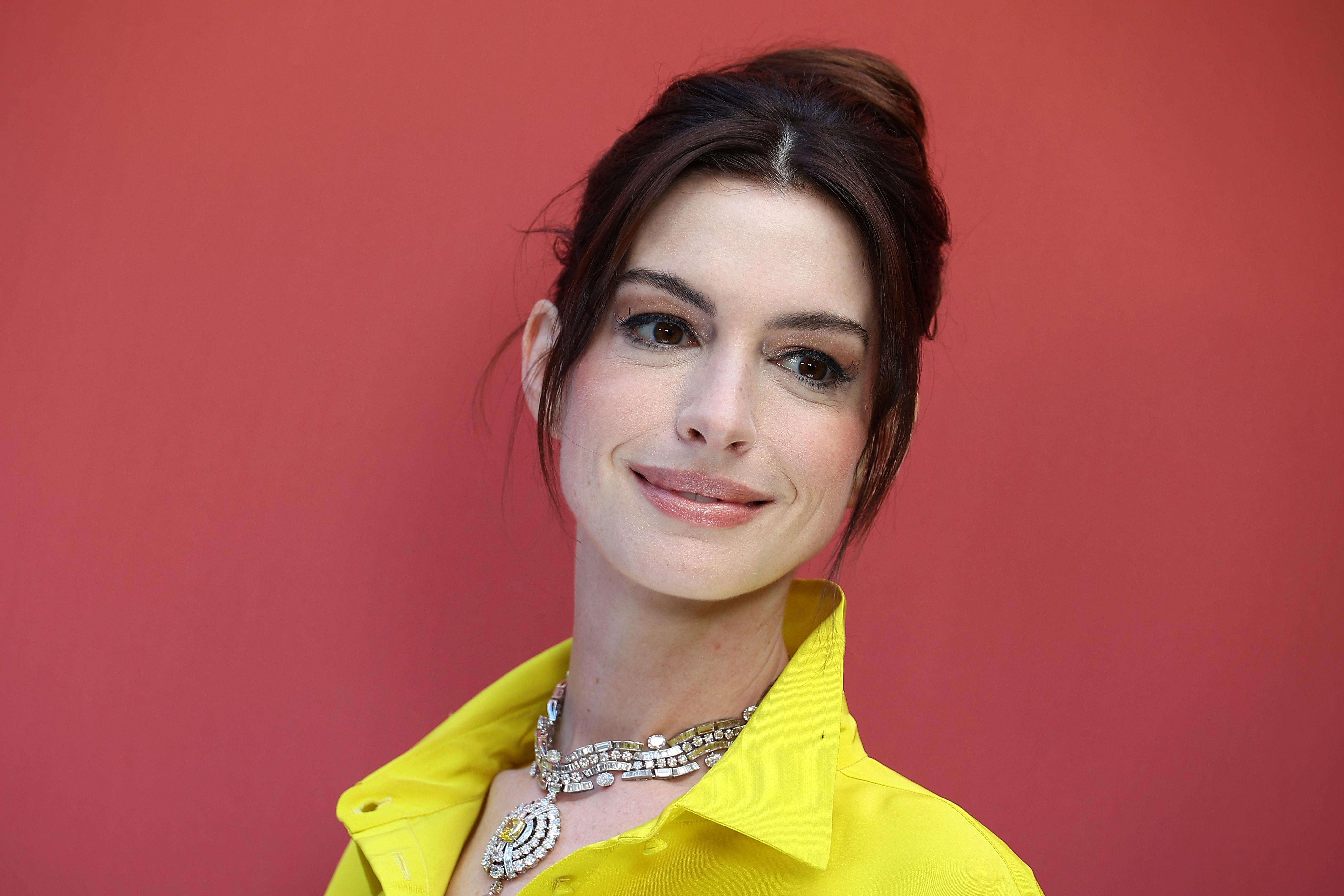 Anne Hathaway Quotes "Donatella" By Lady Gaga To Donatella Versace | iHeart
