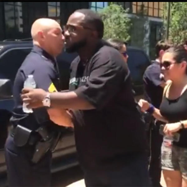 Touching Video Shows People Hugging Dallas Police | iHeart