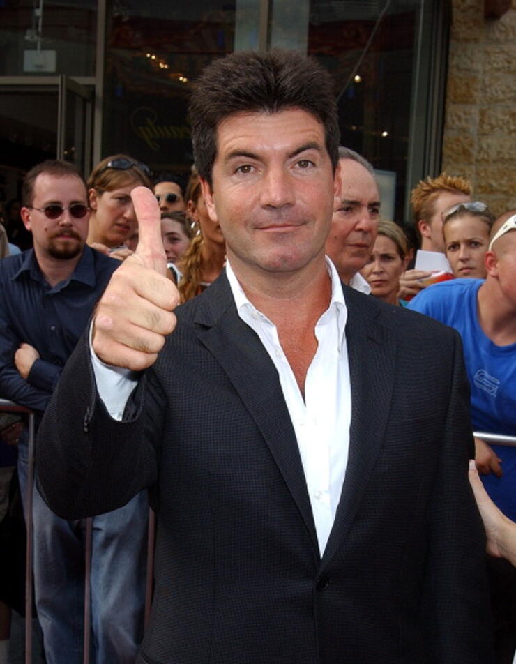 Simon Cowell Has A New Look And He's Getting Dragged For It | iHeartRadio