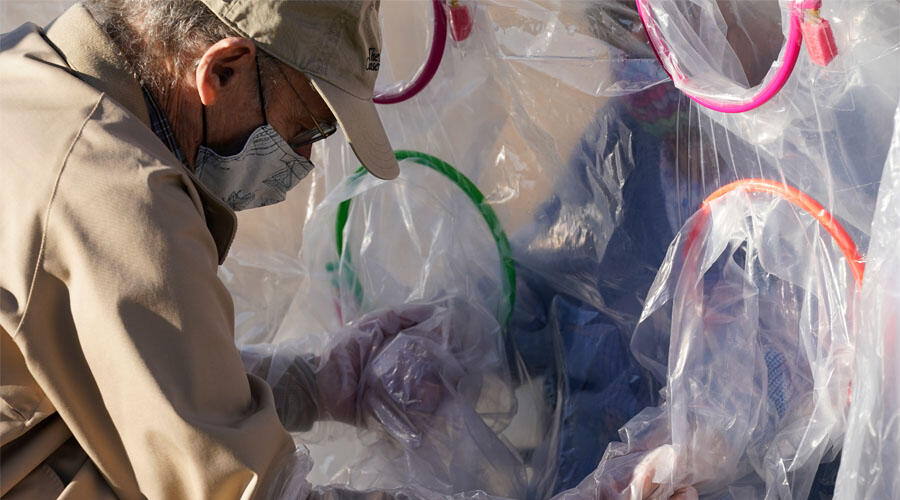 'Hug Tent' Helps The Elderly Reconnect During COVID-19 Pandemic | iHeart