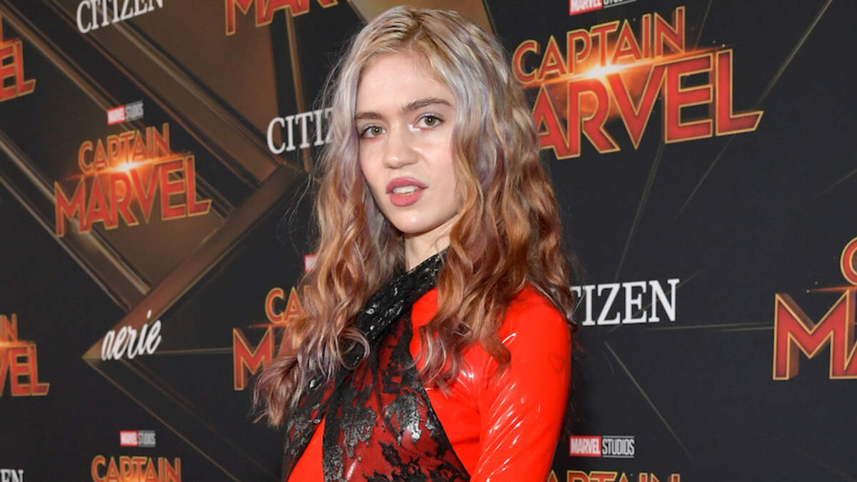 Grimes Shows Off Her New "Beautiful Alien Scars" Tattoo | 103.5 KISS FM ...